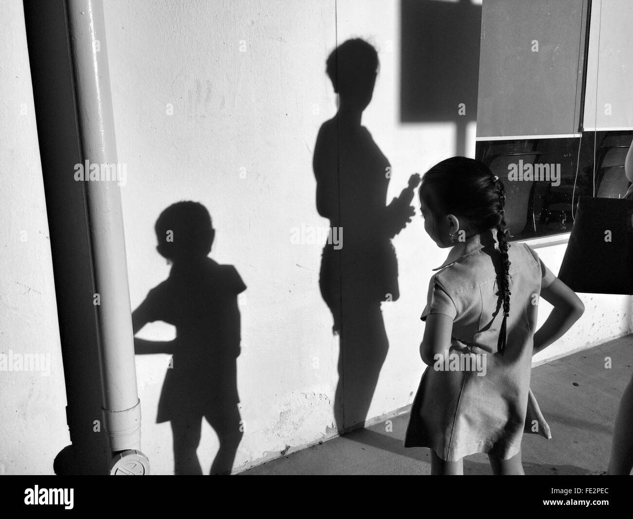 Person shadow on the wall Black and White Stock Photos & Images - Alamy