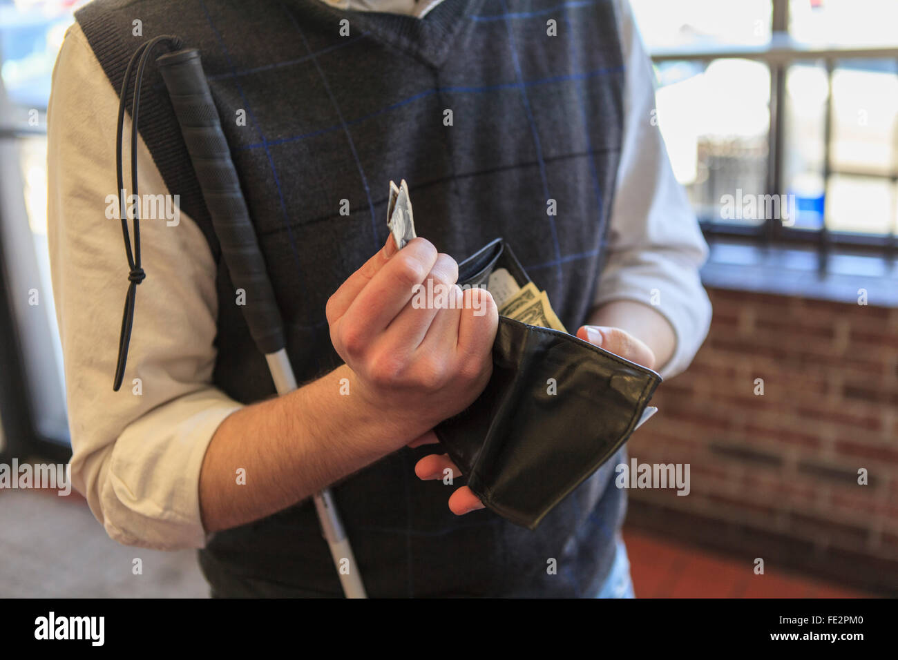 Man counting money hi-res stock photography and images - Alamy