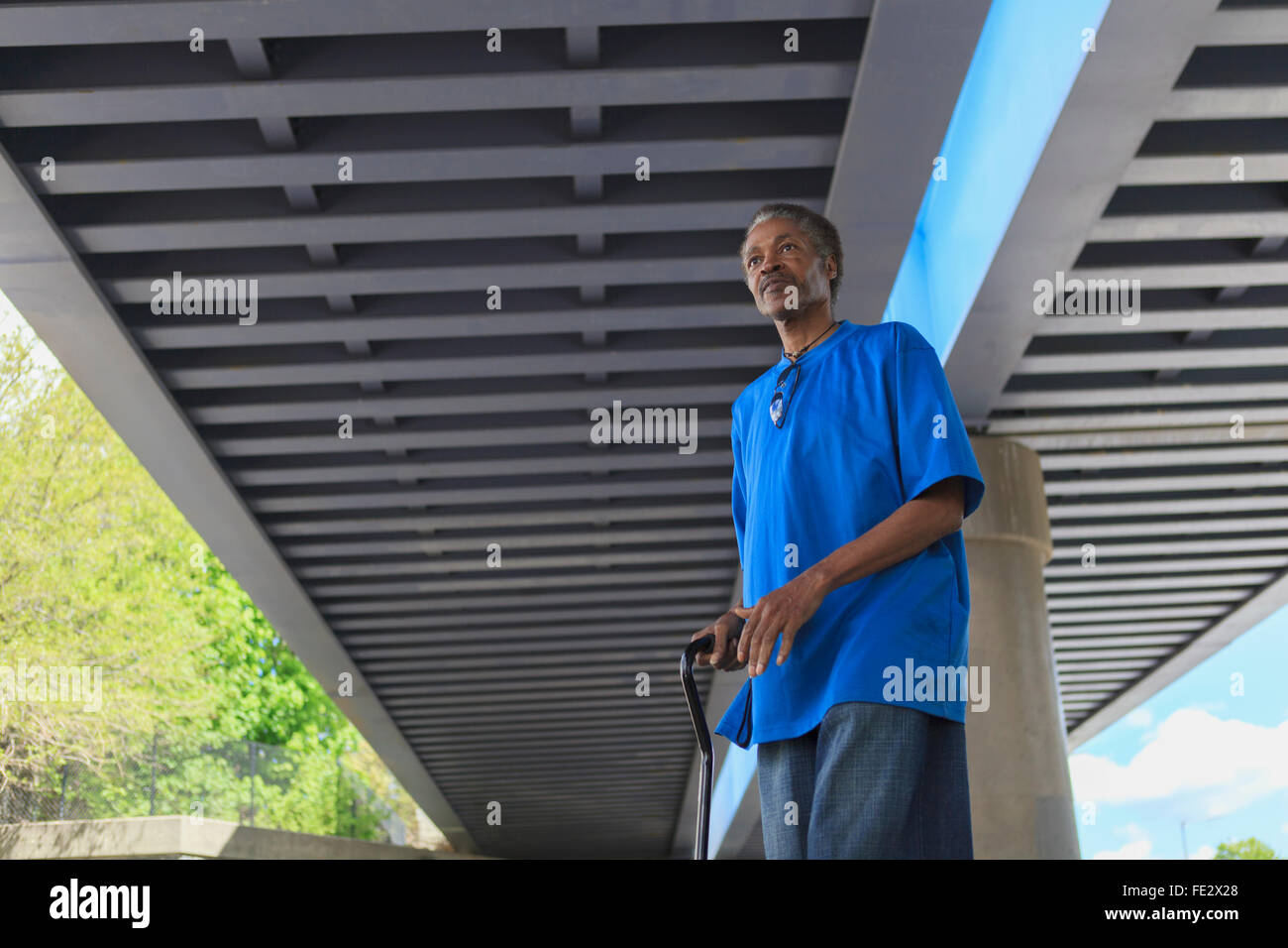 Man with Traumatic Brain Injury taking a walk in his neighborhood Stock ...