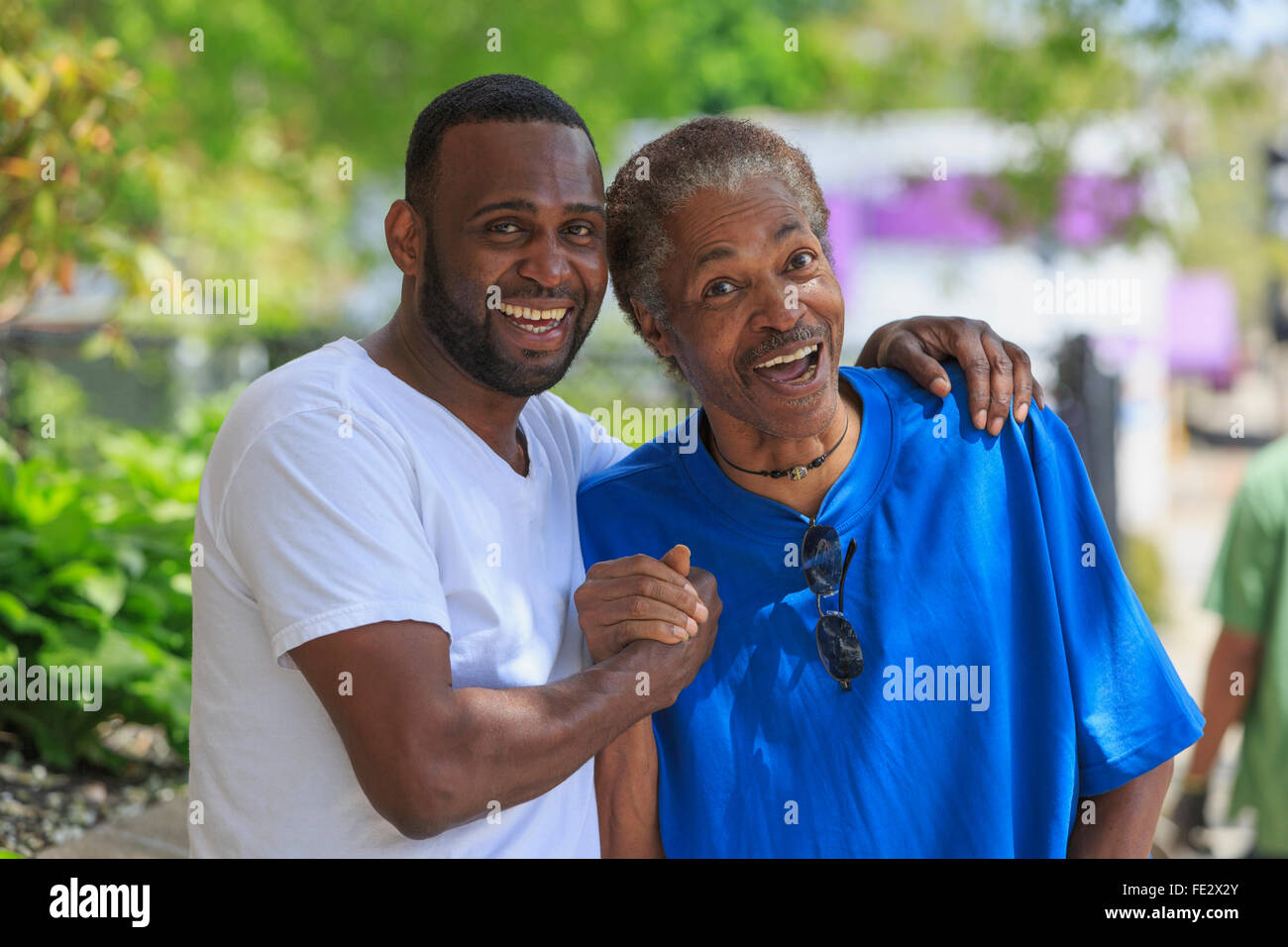 Man with Traumatic Brain Injury enjoying the day with his friend Stock ...
