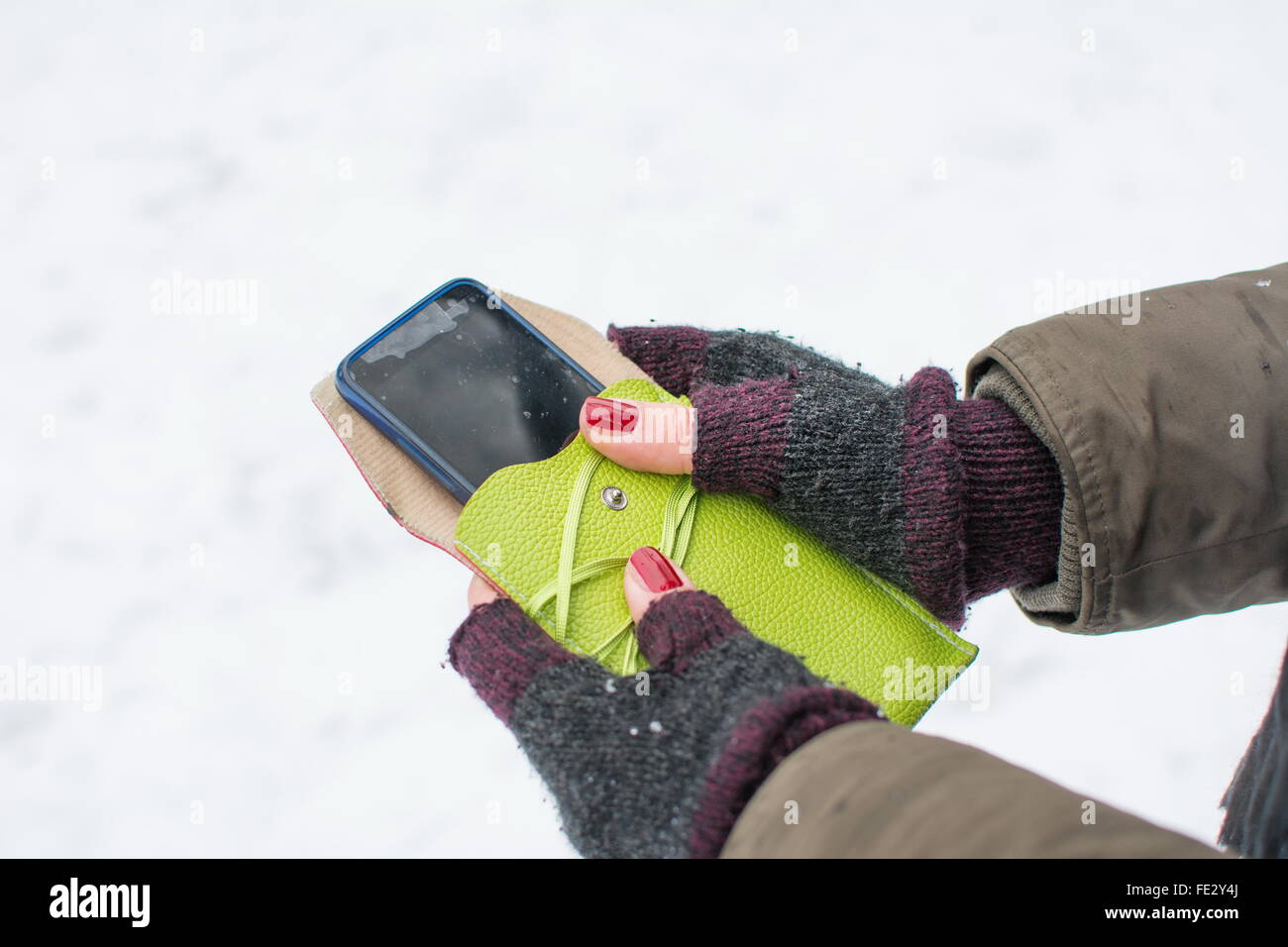 Woman girl holding smartphone in hi-res stock photography and images ...