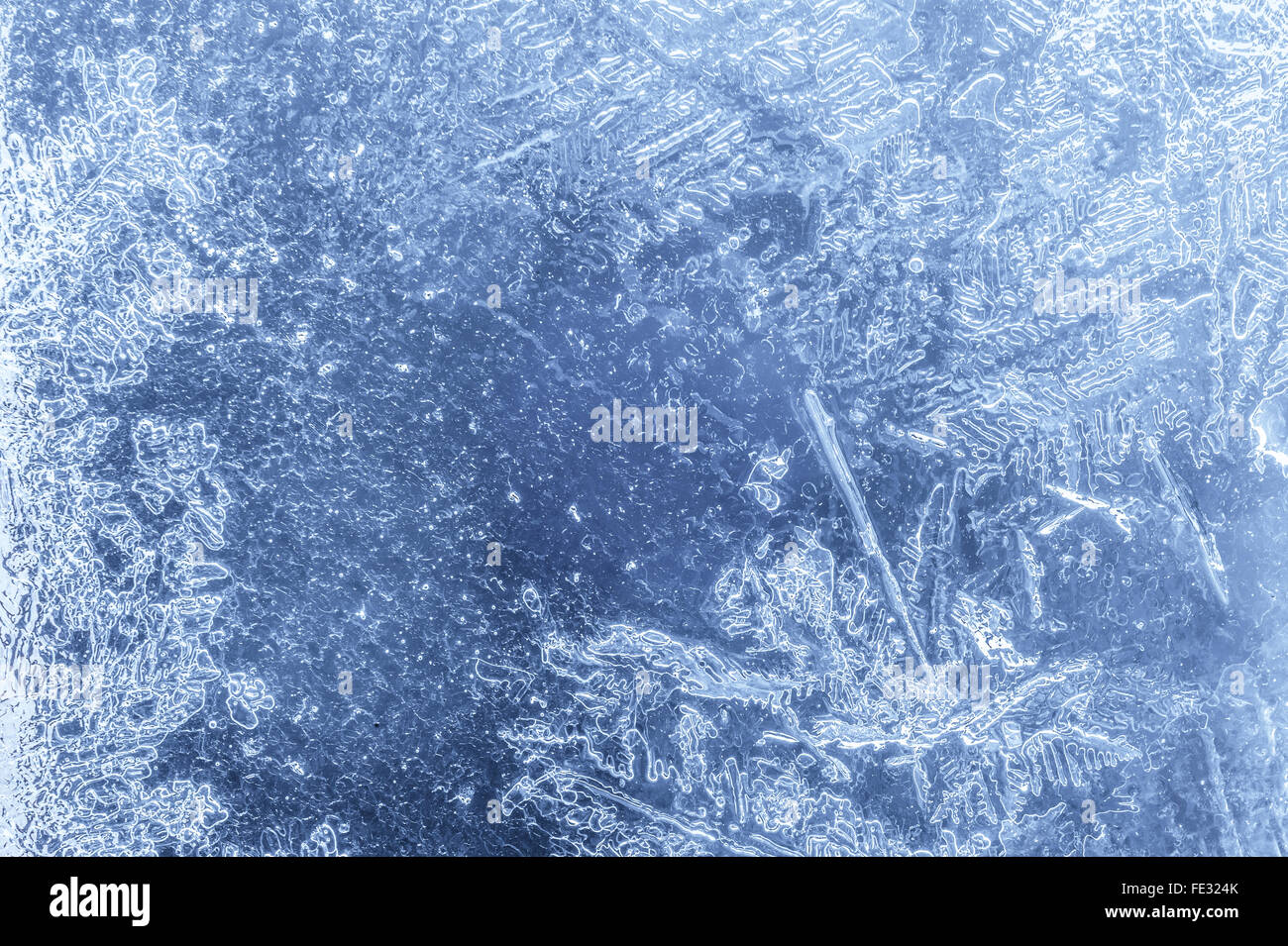 Through a transparent and melting layer of ice Stock Photo - Alamy