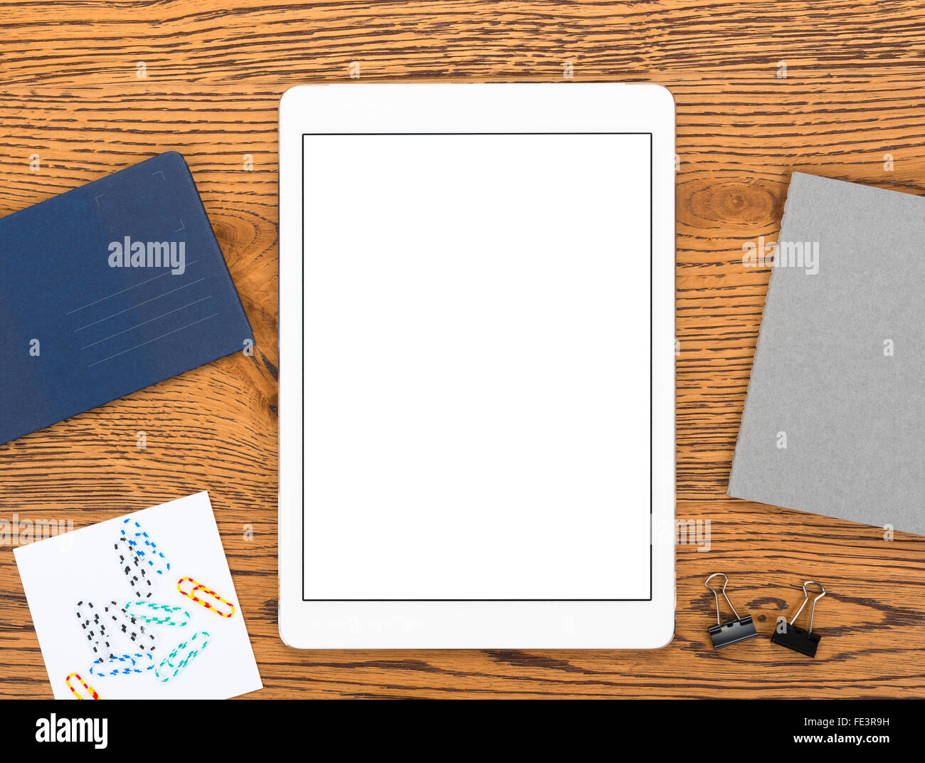 Workplace with white tablet computer Stock Photo - Alamy