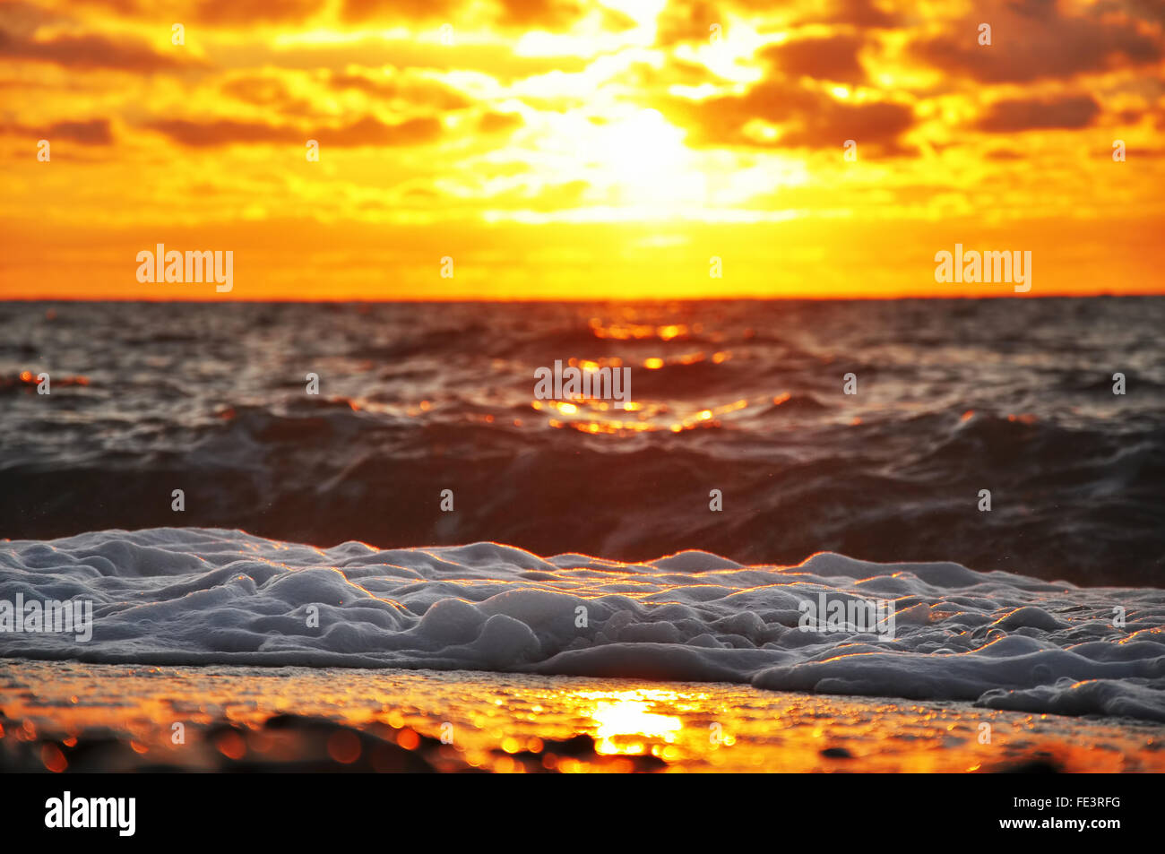 Beautiful sunrise waves over sea hi-res stock photography and images ...