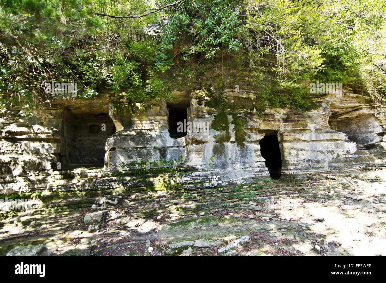 Nekropolis at Argiroupoli, historic roman graves carved into rock ...