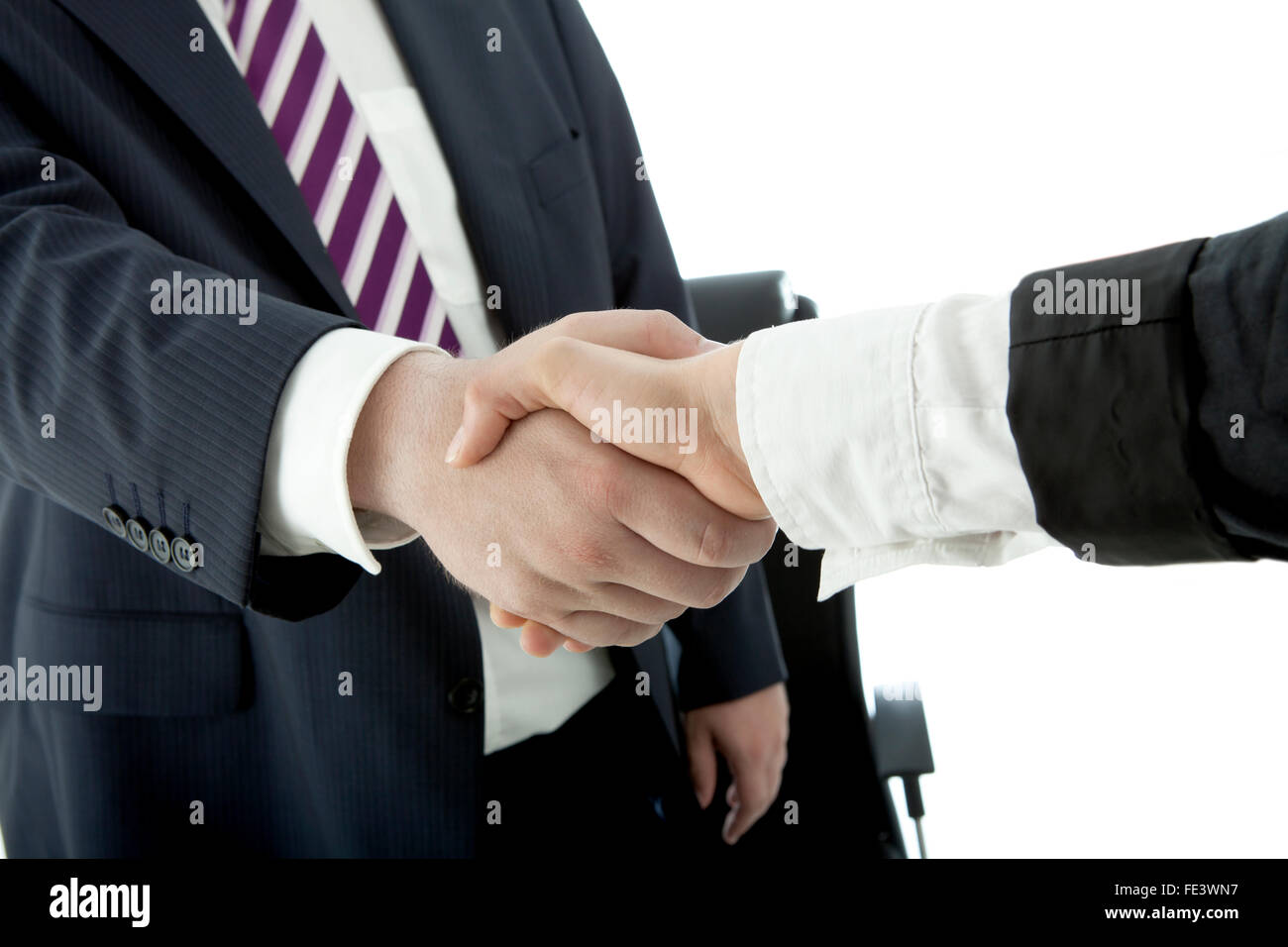 handshake of business man and woman in suit Stock Photo - Alamy
