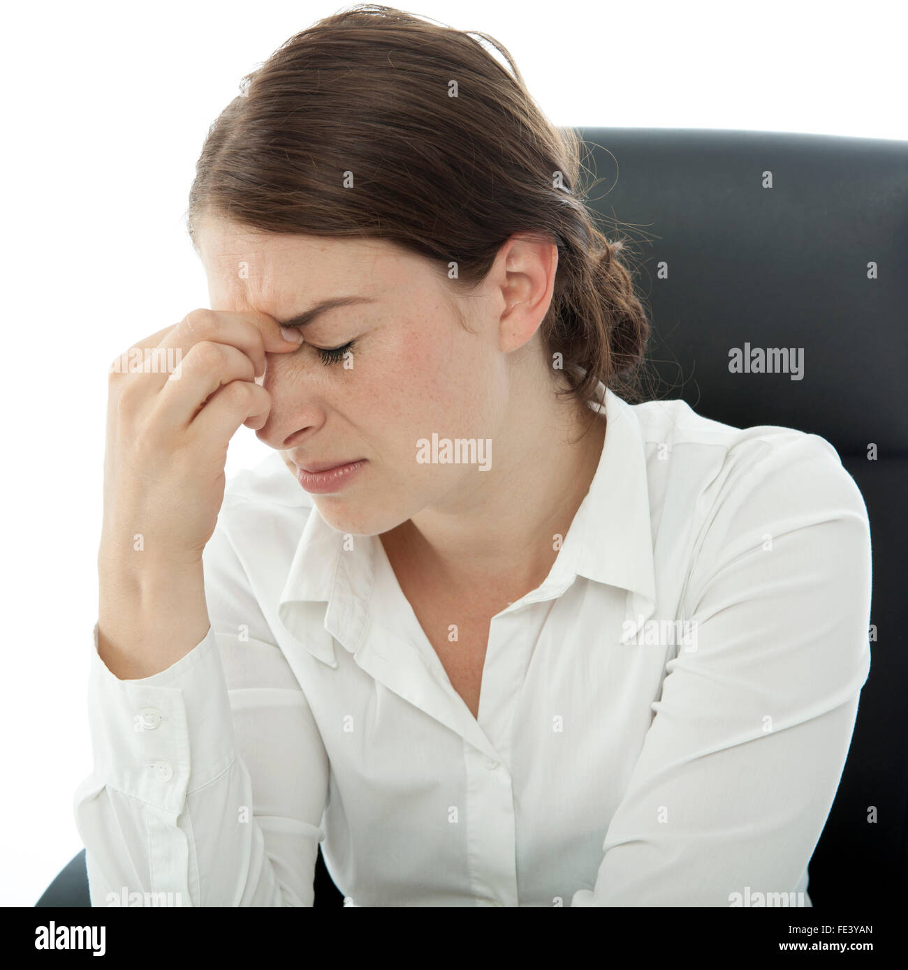 young brunette business woman headache touch head with finger Stock ...