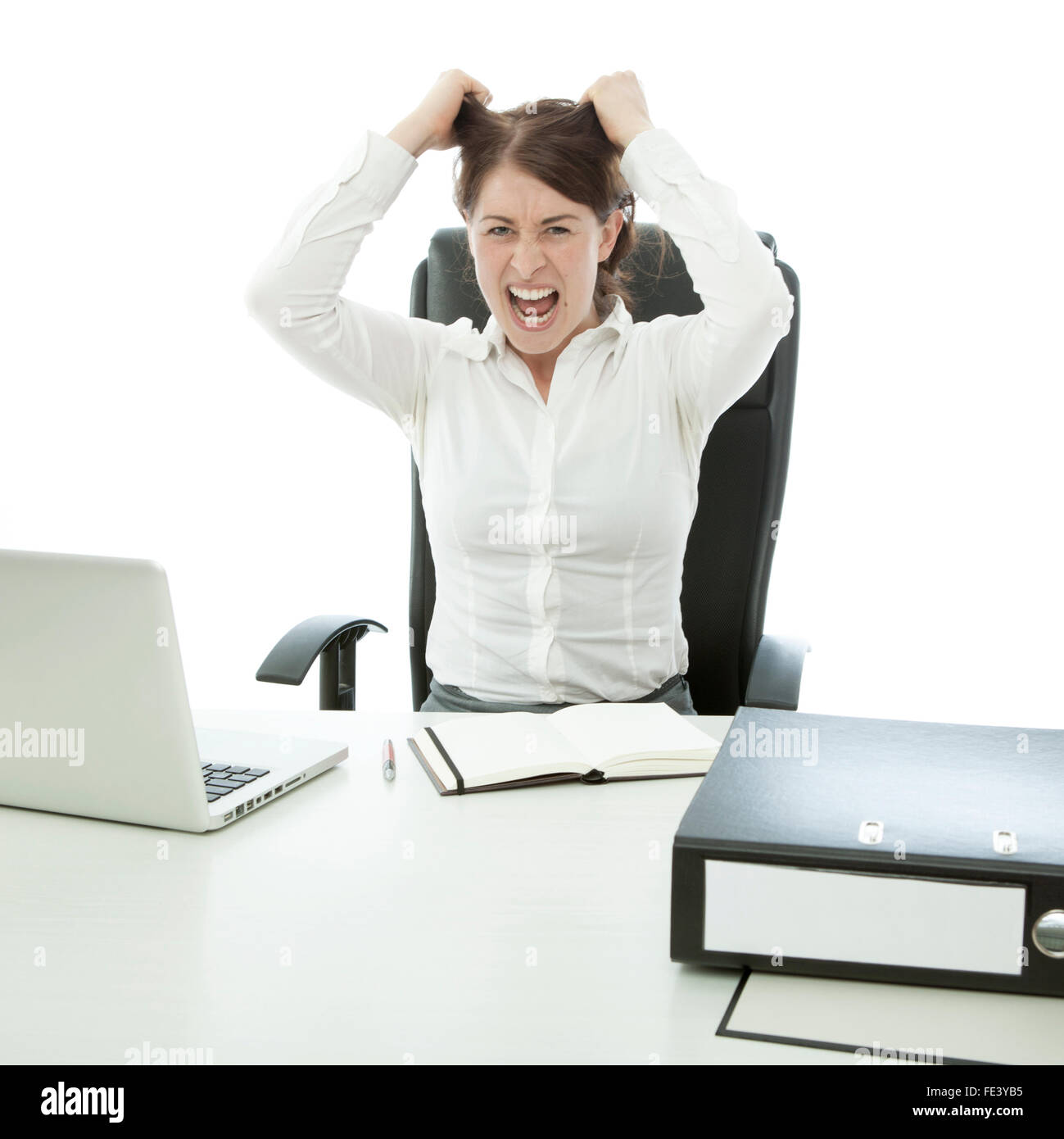 young brunette business woman is frustrated hands on head and hair ...