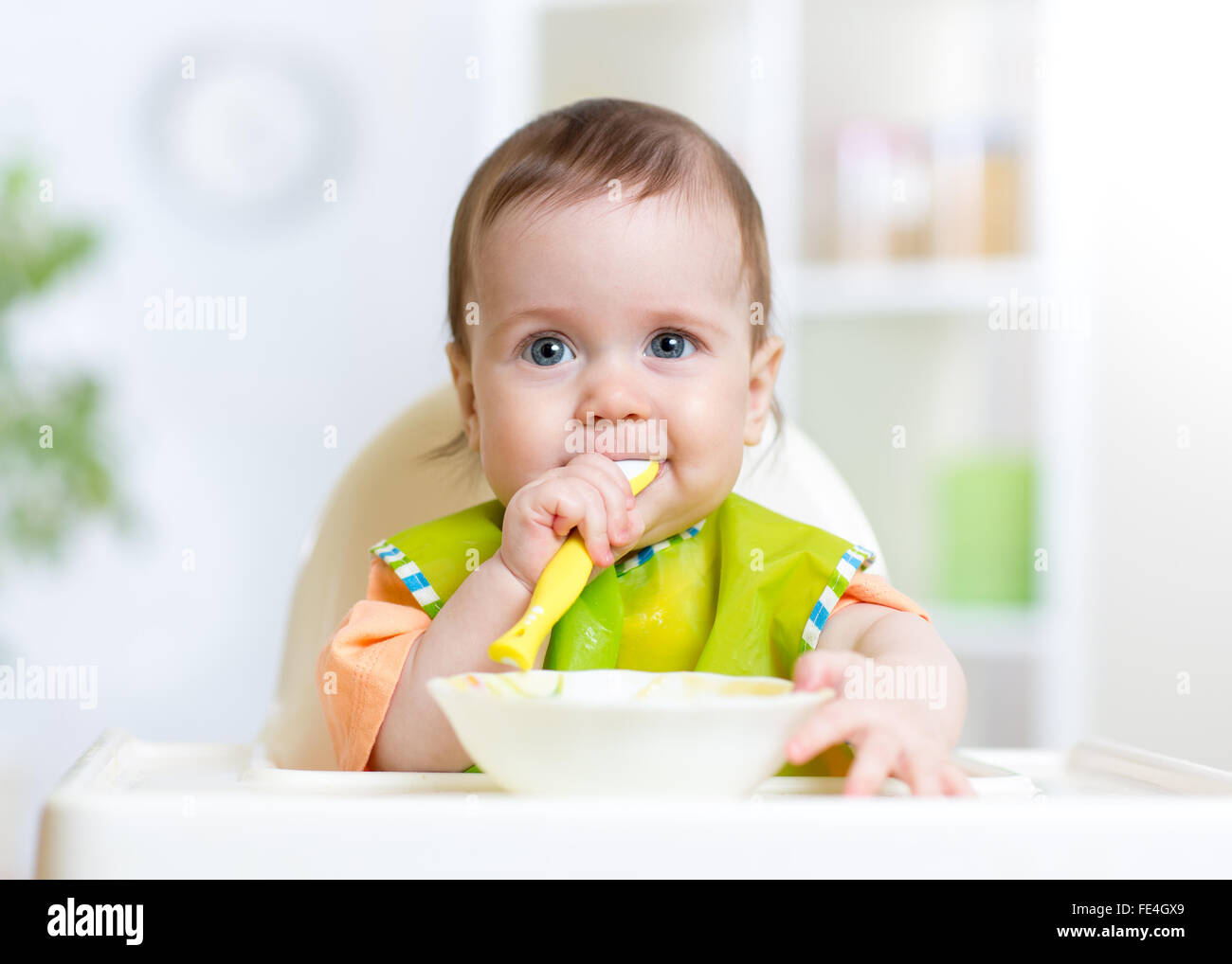 Funny smiling kid eating apple hi-res stock photography and images - Alamy