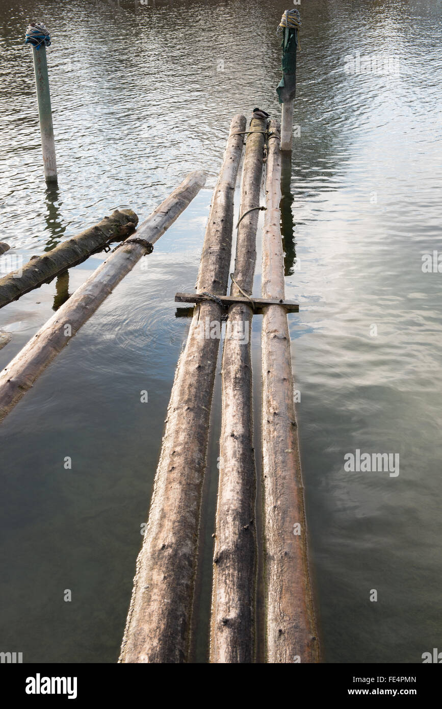 boat impact protection at the bridge at lake chiemsee Stock Photo - Alamy