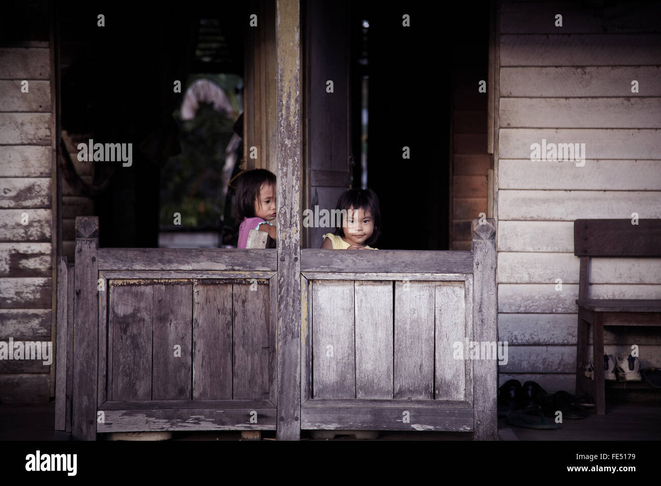 children at the widow in Borneo in Indonesia Stock Photo - Alamy
