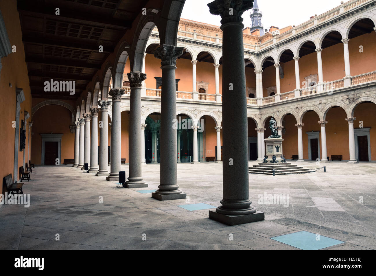 Side View of Historical Palace Courtyard Colonnade and Center Statue ...