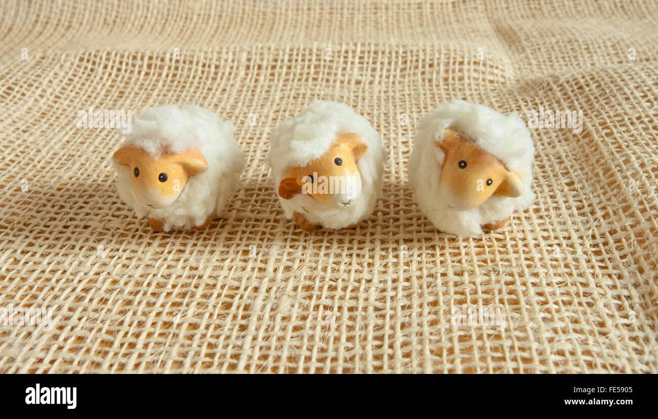 Three cute sheep in the farm Stock Photo - Alamy