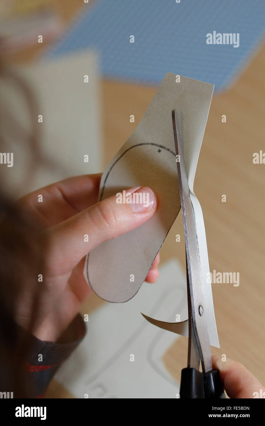 Female hands cutting a paper, for handmade crafts Stock Photo - Alamy