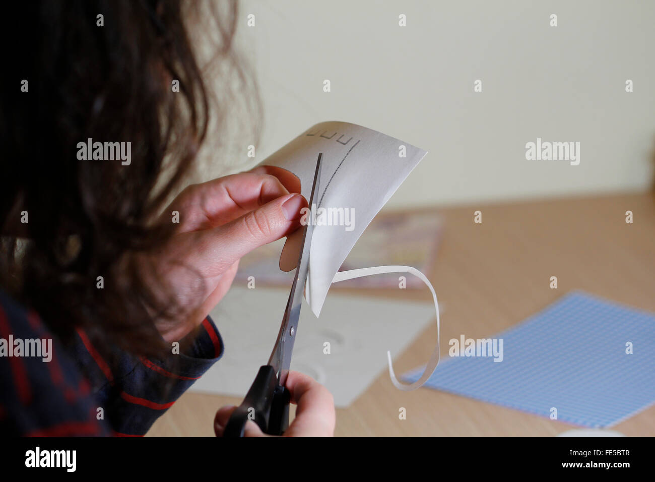 Artisan woman cutting paper hi-res stock photography and images - Alamy