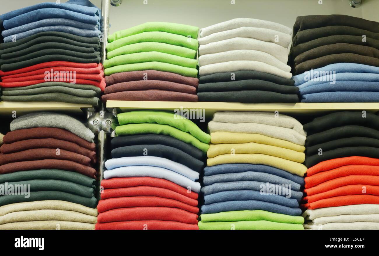 Shopping shelfs with cloth Stock Photo - Alamy