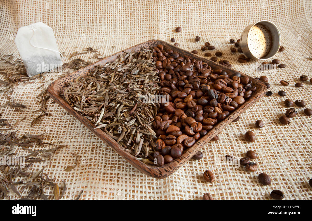 dried tea leaves and roasted coffee beans: theine vs caffeine Stock ...