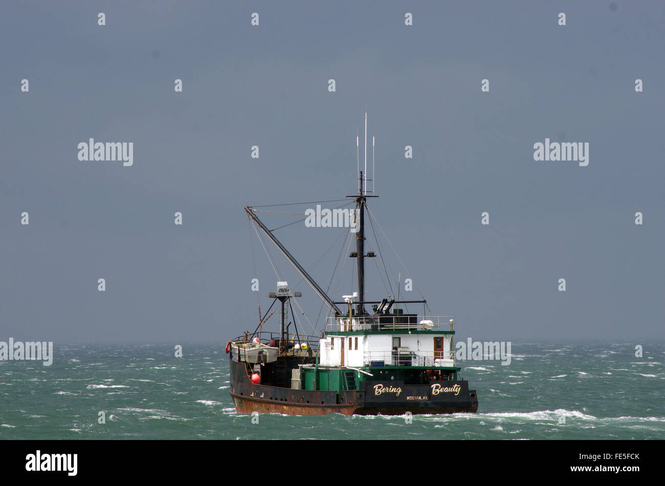 Fish tender boat traveling in choppy seas in Bristol Bay Alaska Stock ...