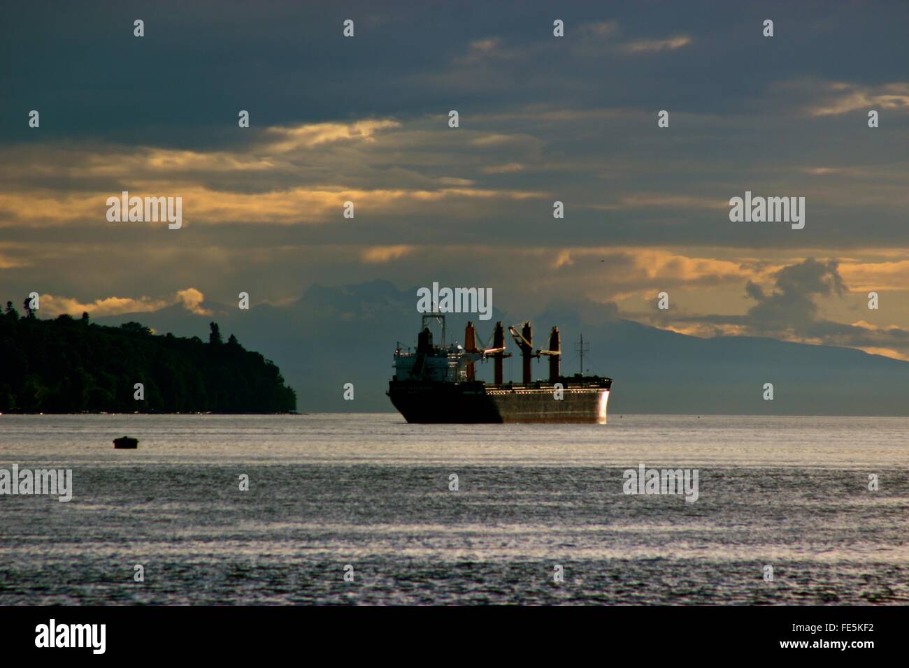 Ship At Dusk, Reflecting Water Surface Stock Photo - Alamy