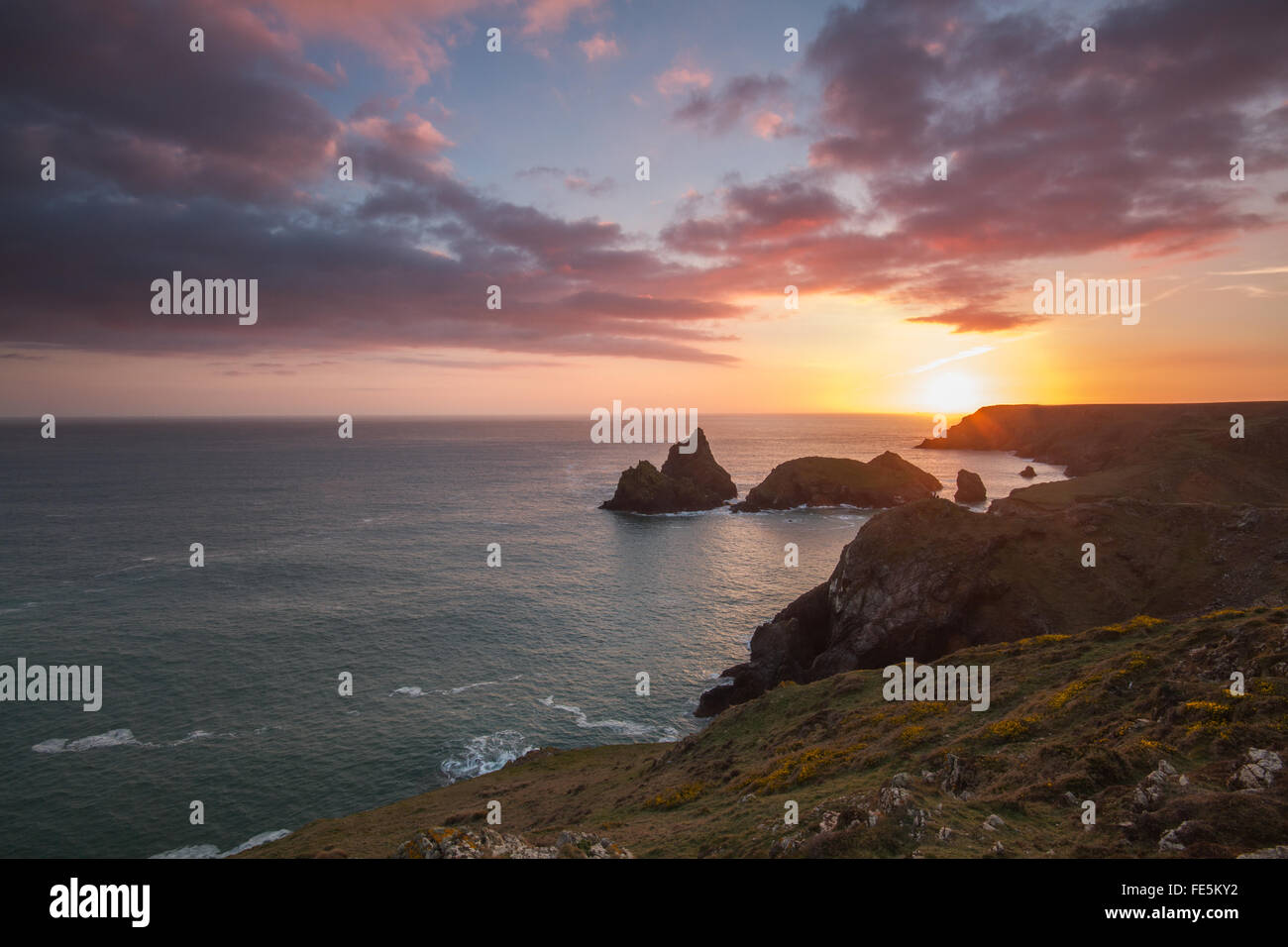 A rugged coastal sunset in Cornwall. Cliffs overlooking the ocean at ...