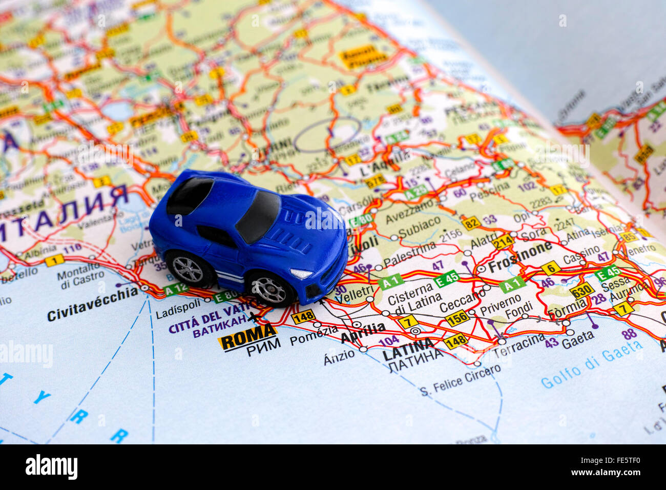 Toy car driving road map hi-res stock photography and images - Alamy