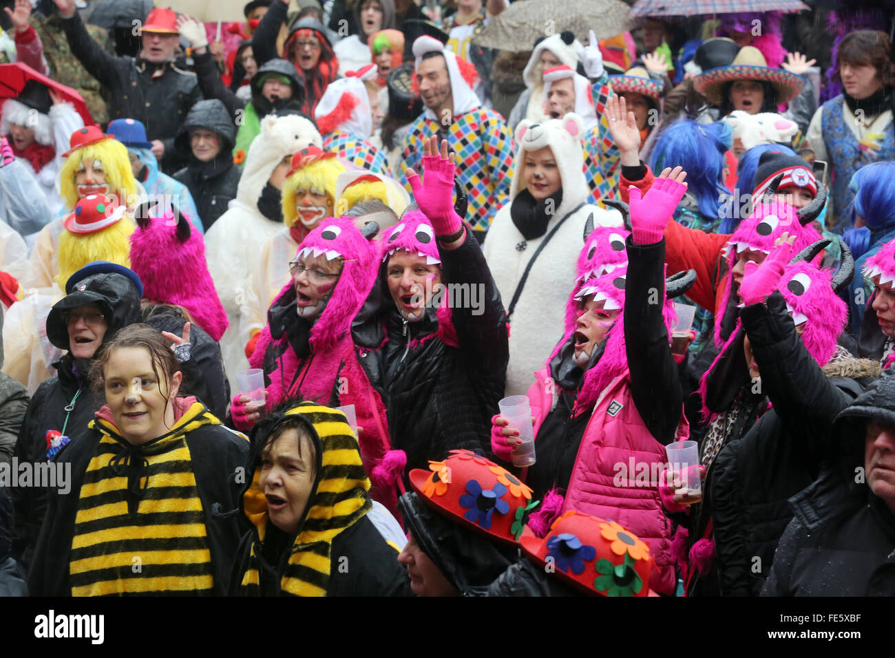 Duesseldorf, Germany. 4th Feb, 2016. Costumed carnival revelers ...