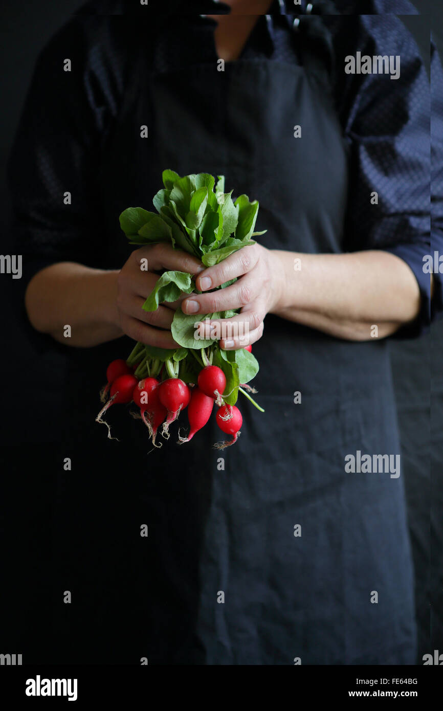 Radish hands hi-res stock photography and images - Alamy
