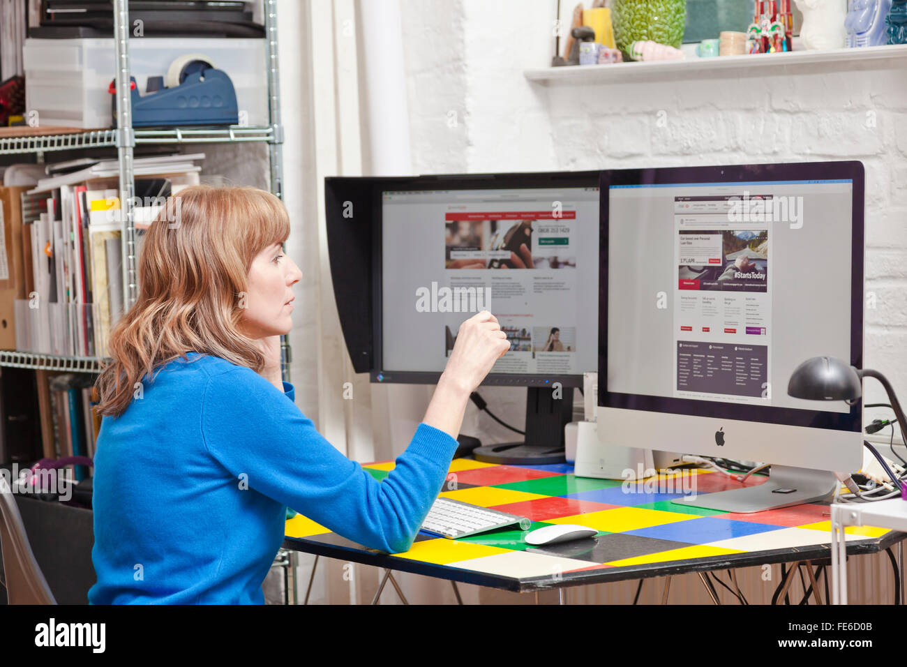 Woman checks her Internet bank account on a computer Stock Photo - Alamy