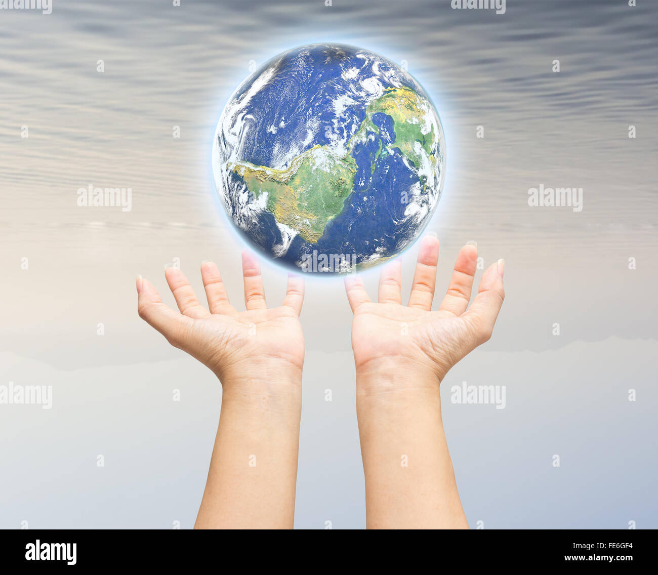Human hand holding Earth planet. Elements of this image are furnished ...