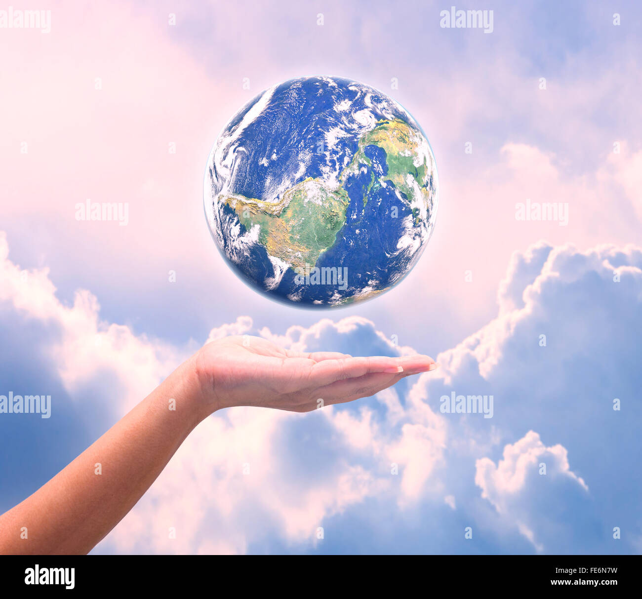 Human hand holding Earth planet. Elements of this image are furnished ...
