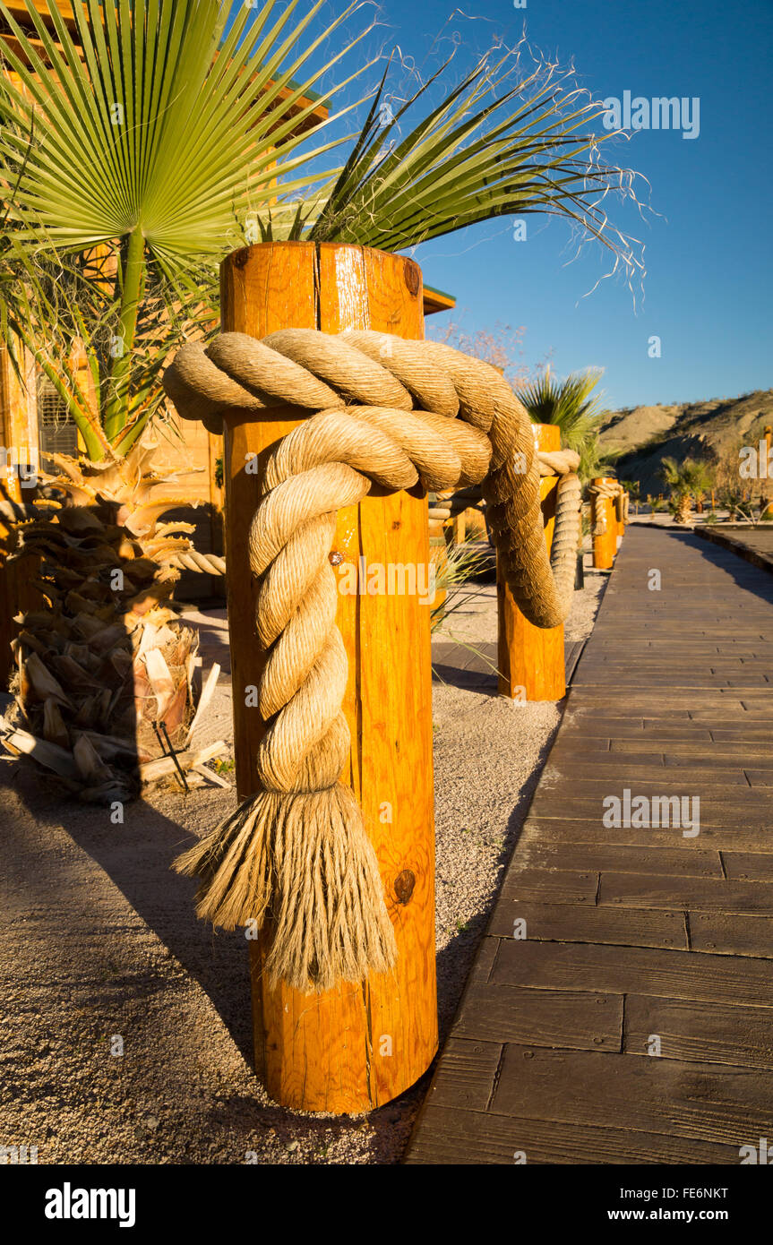 Palm trees and ropes on boardwalk in California Stock Photo - Alamy