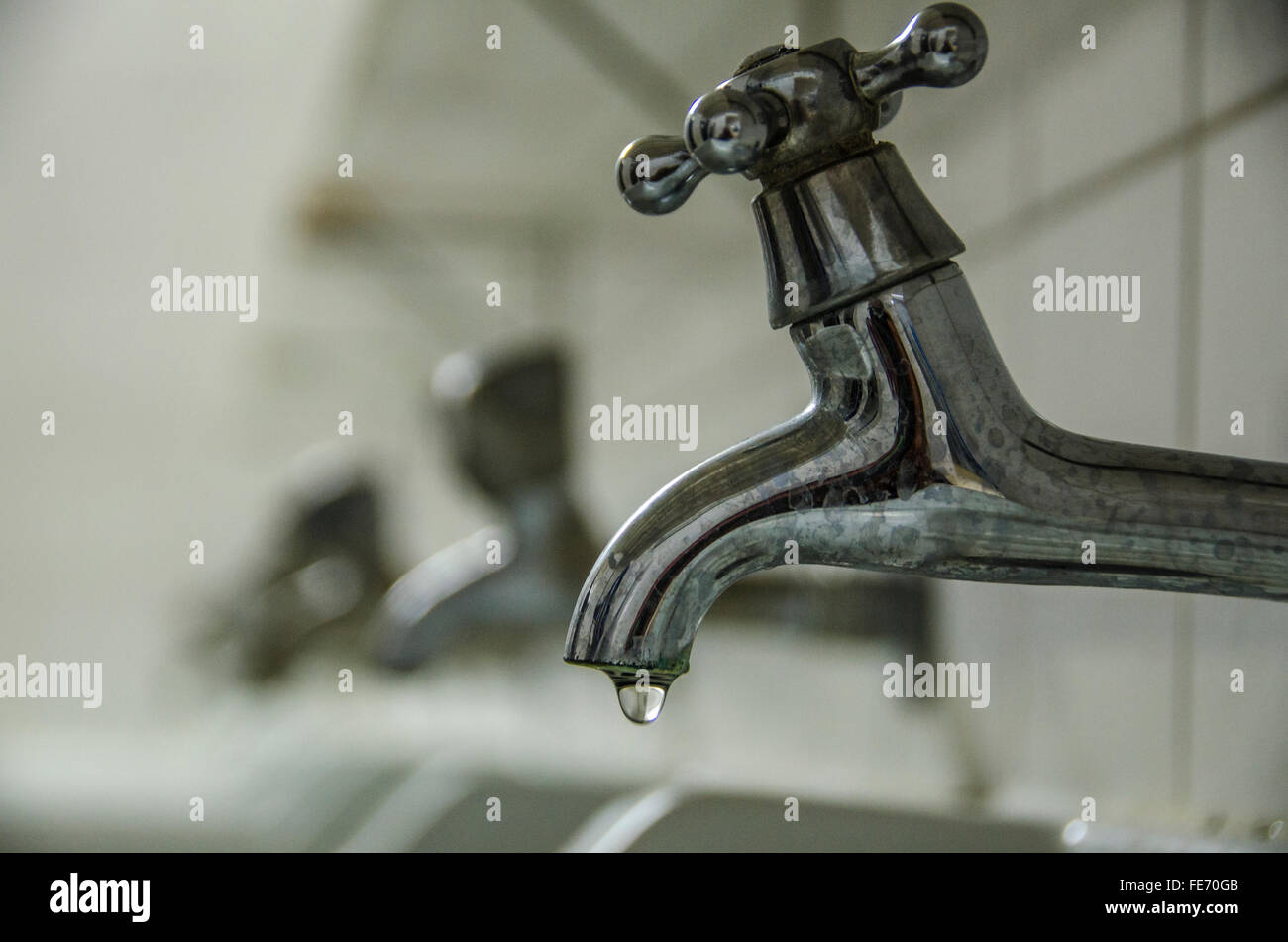 Communal water tap hi-res stock photography and images - Alamy