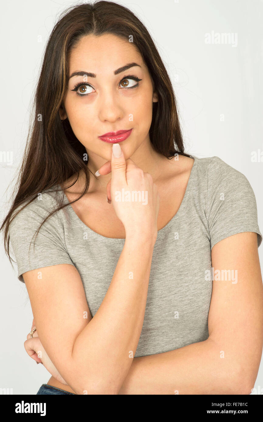 Thoughtful Young Woman Pondering and Considering Her Future Stock Photo ...