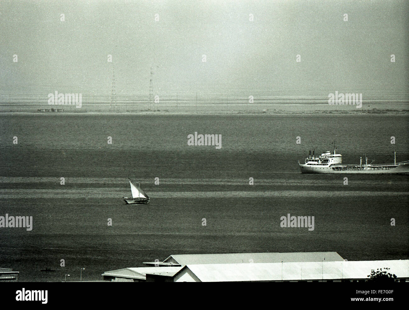 Ship and dhow by Mermaid Club off Aden Yemen 1967 British withdrawal ...
