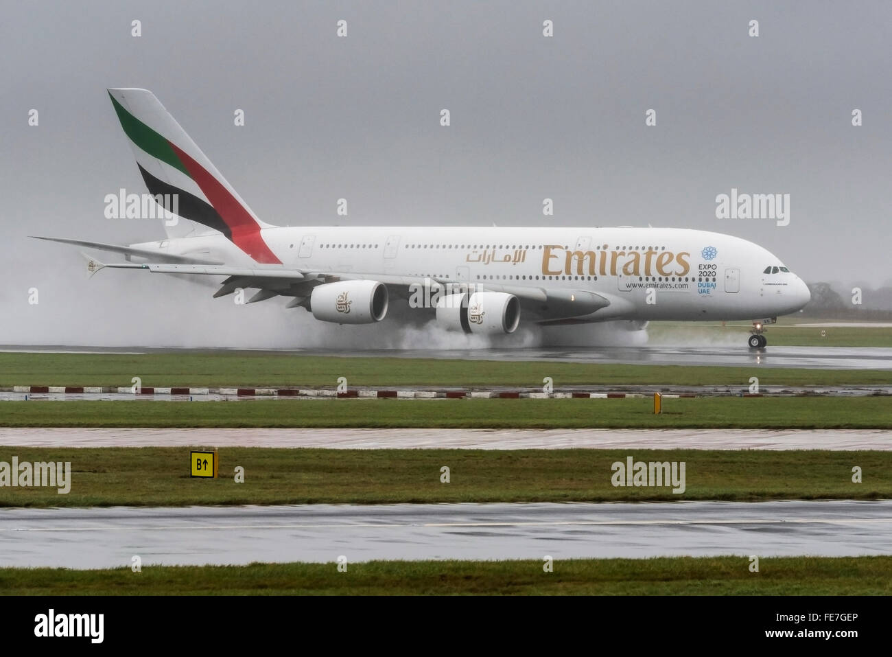 Emirates Airbus A380-800 in the wet at Manchester airport Stock Photo ...