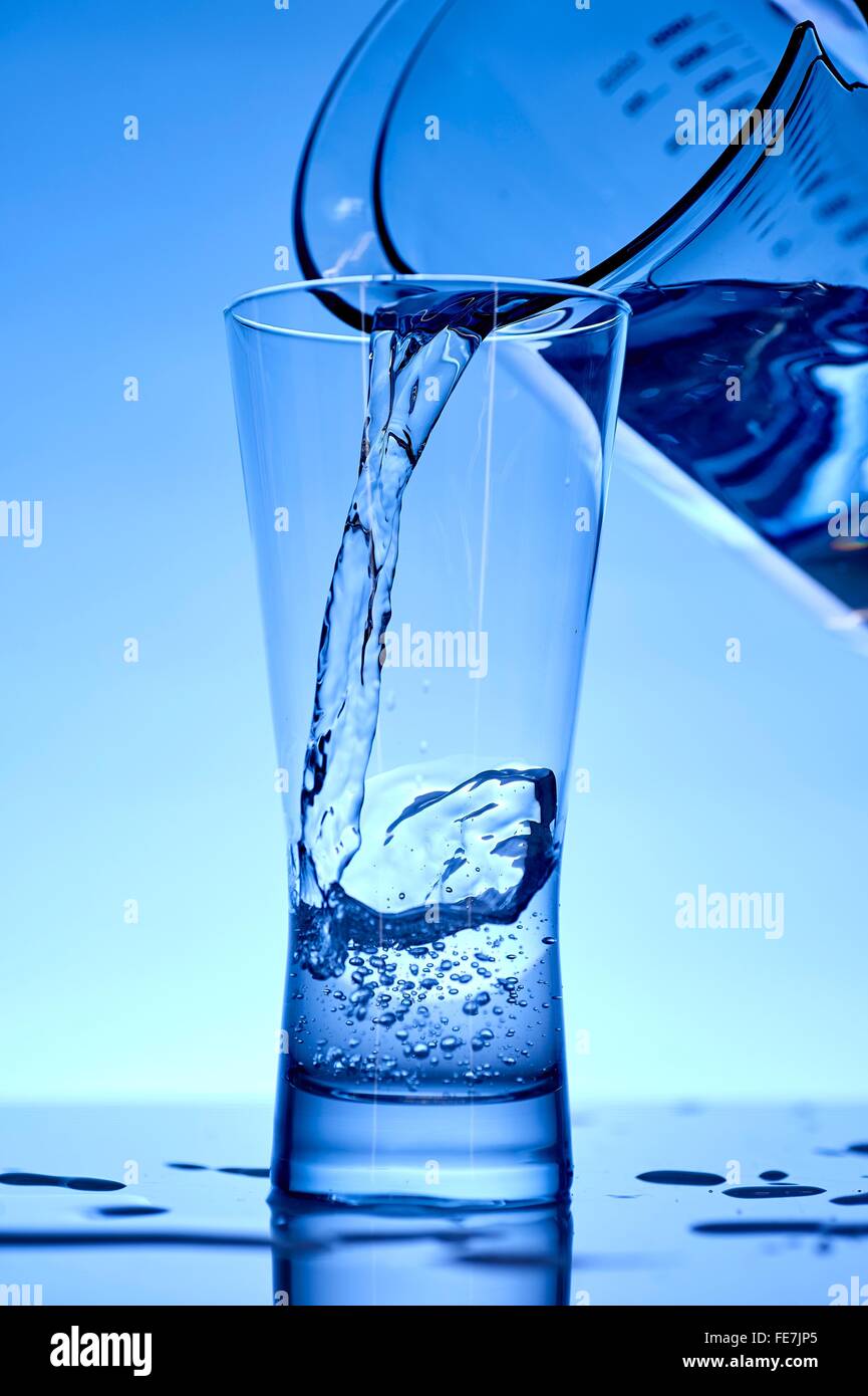 A studio photo of a tall water glass Stock Photo - Alamy