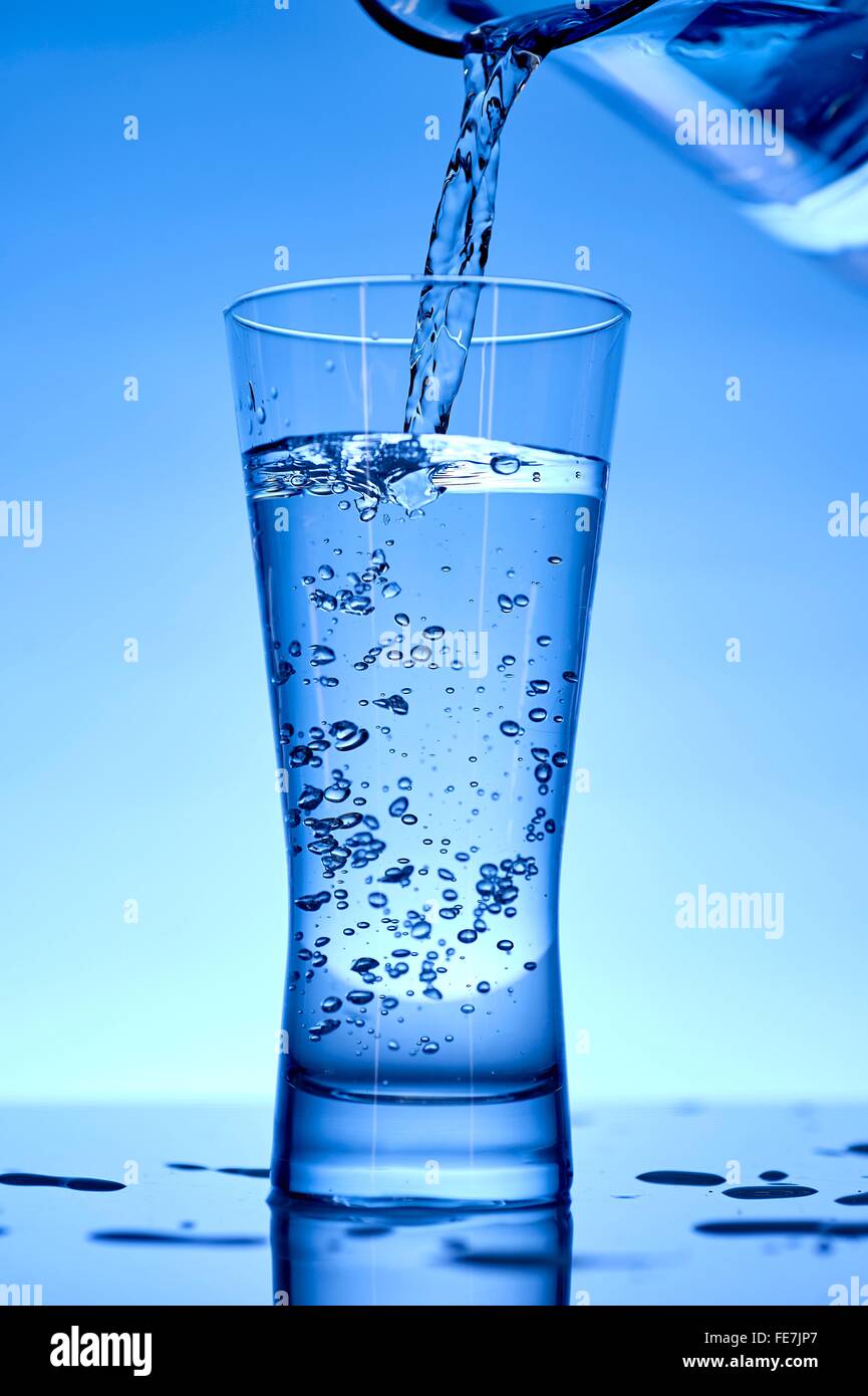 A studio photo of a tall water glass Stock Photo - Alamy