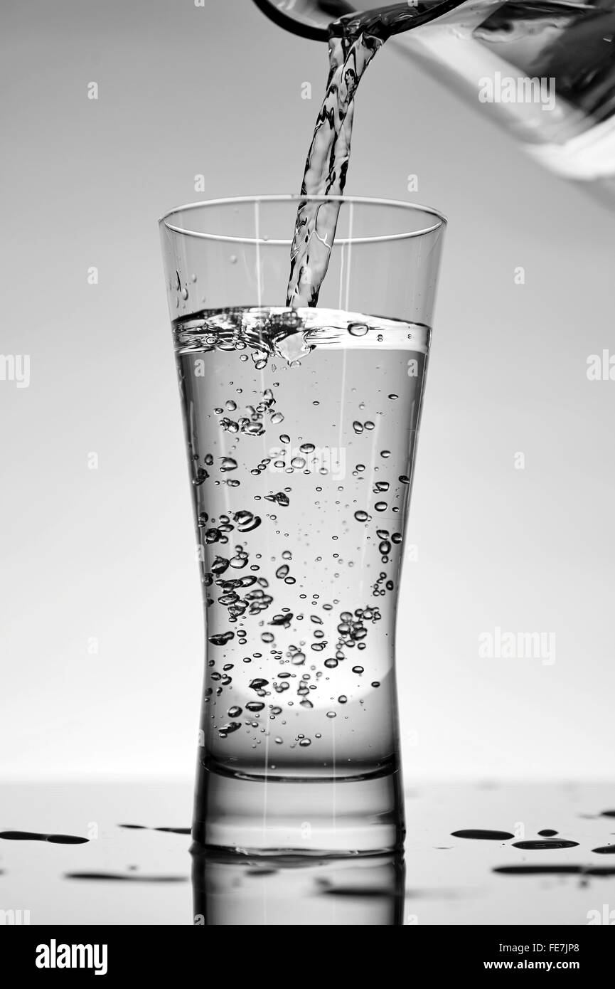 A studio photo of a tall water glass Stock Photo - Alamy