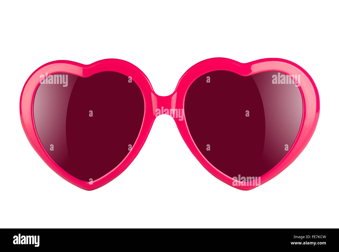 A pair of pink heart shaped sun glasses with violet lenses isolated on ...