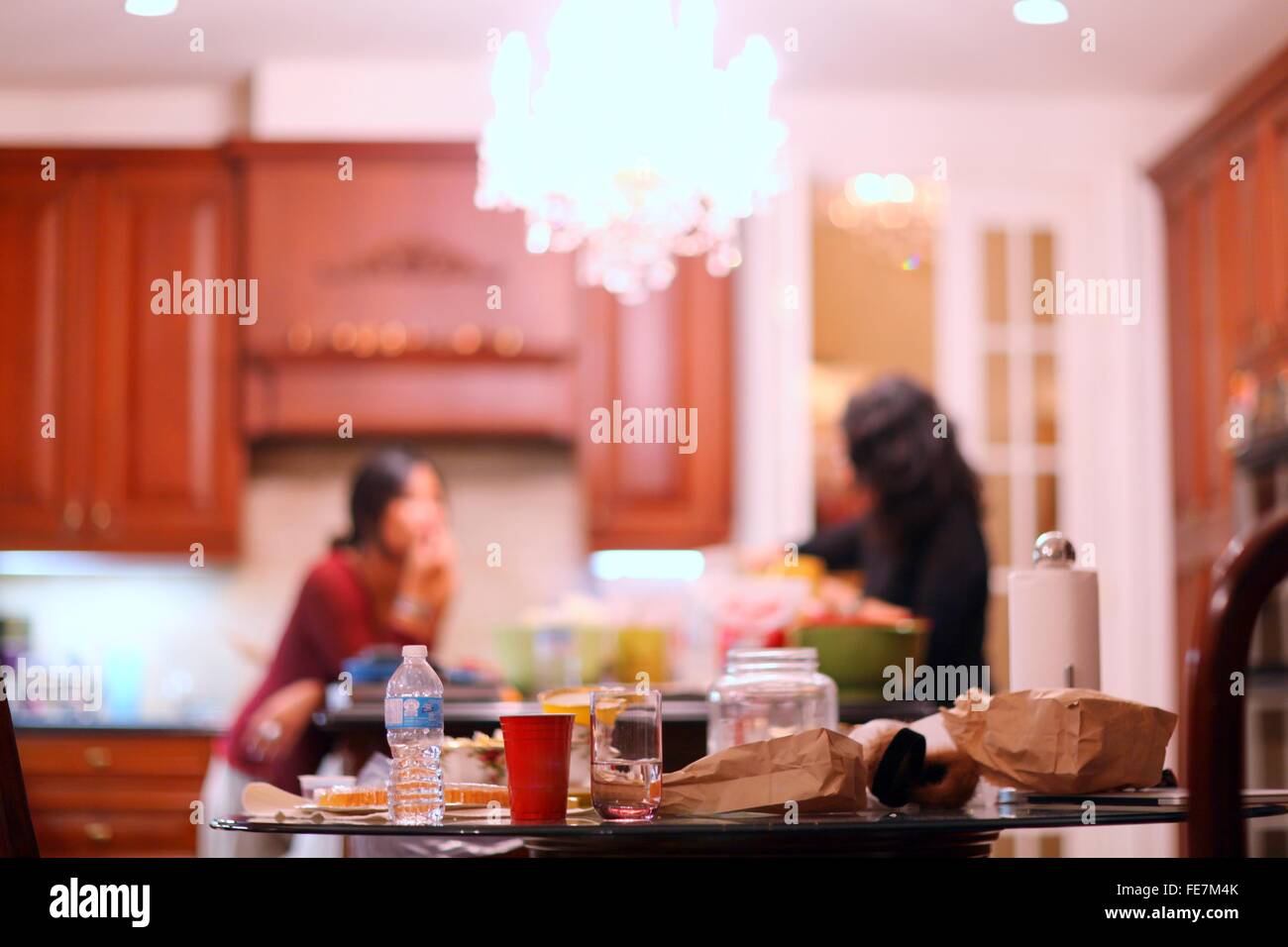 Women In Kitchen At Home Stock Photo - Alamy