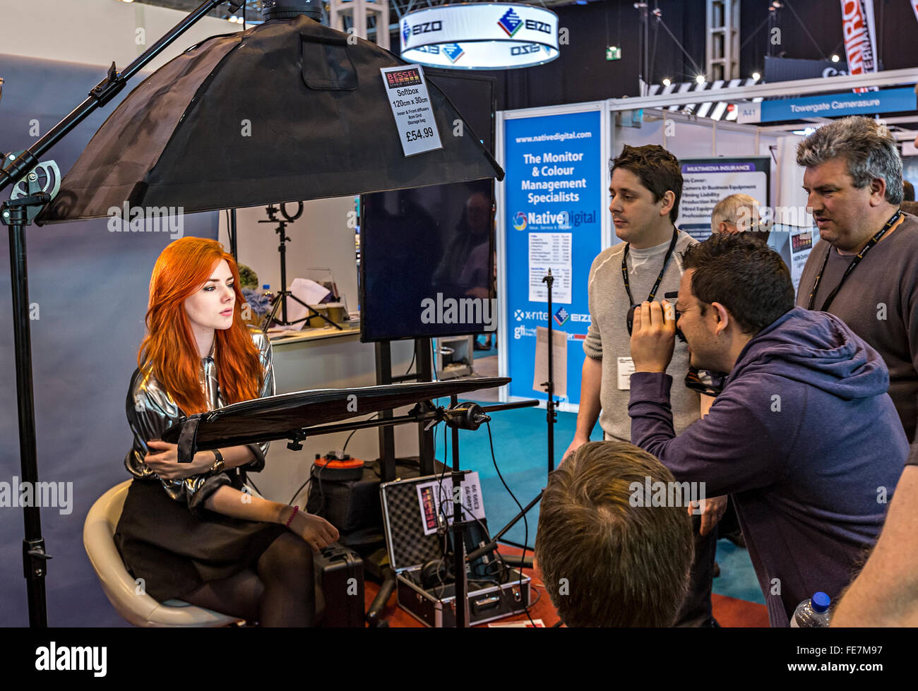 Lighting demonstration with model being photographed at the photography ...