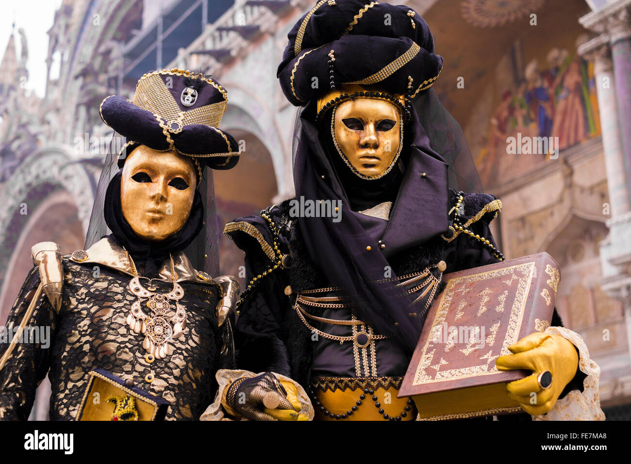 Two Venetian carnival costumes, Italy Stock Photo - Alamy