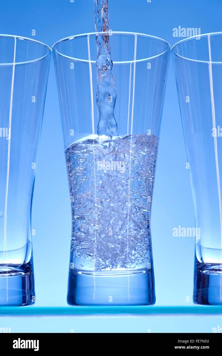 A studio photo of a tall water glass Stock Photo - Alamy