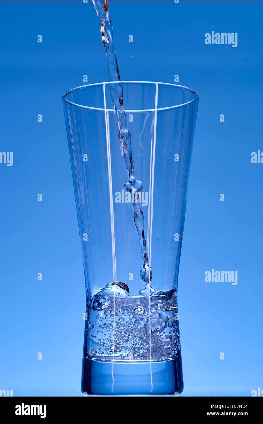 A studio photo of a tall water glass Stock Photo - Alamy