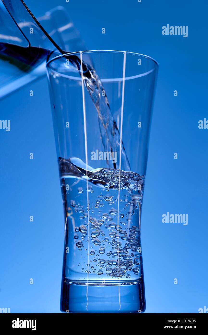 A studio photo of a tall water glass Stock Photo - Alamy