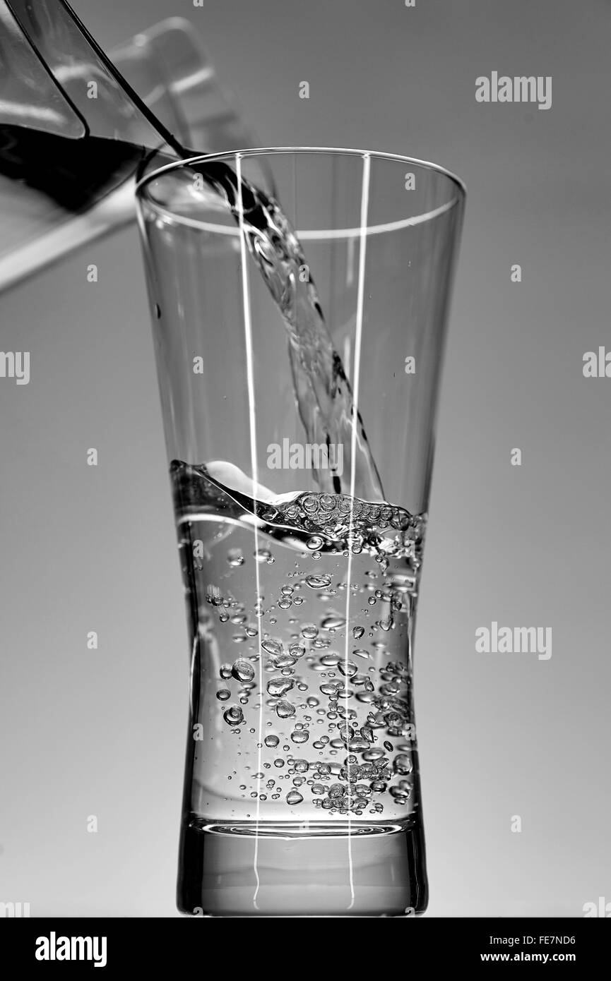 A studio photo of a tall water glass Stock Photo - Alamy
