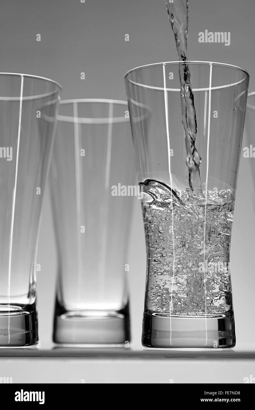 A studio photo of a tall water glass Stock Photo - Alamy