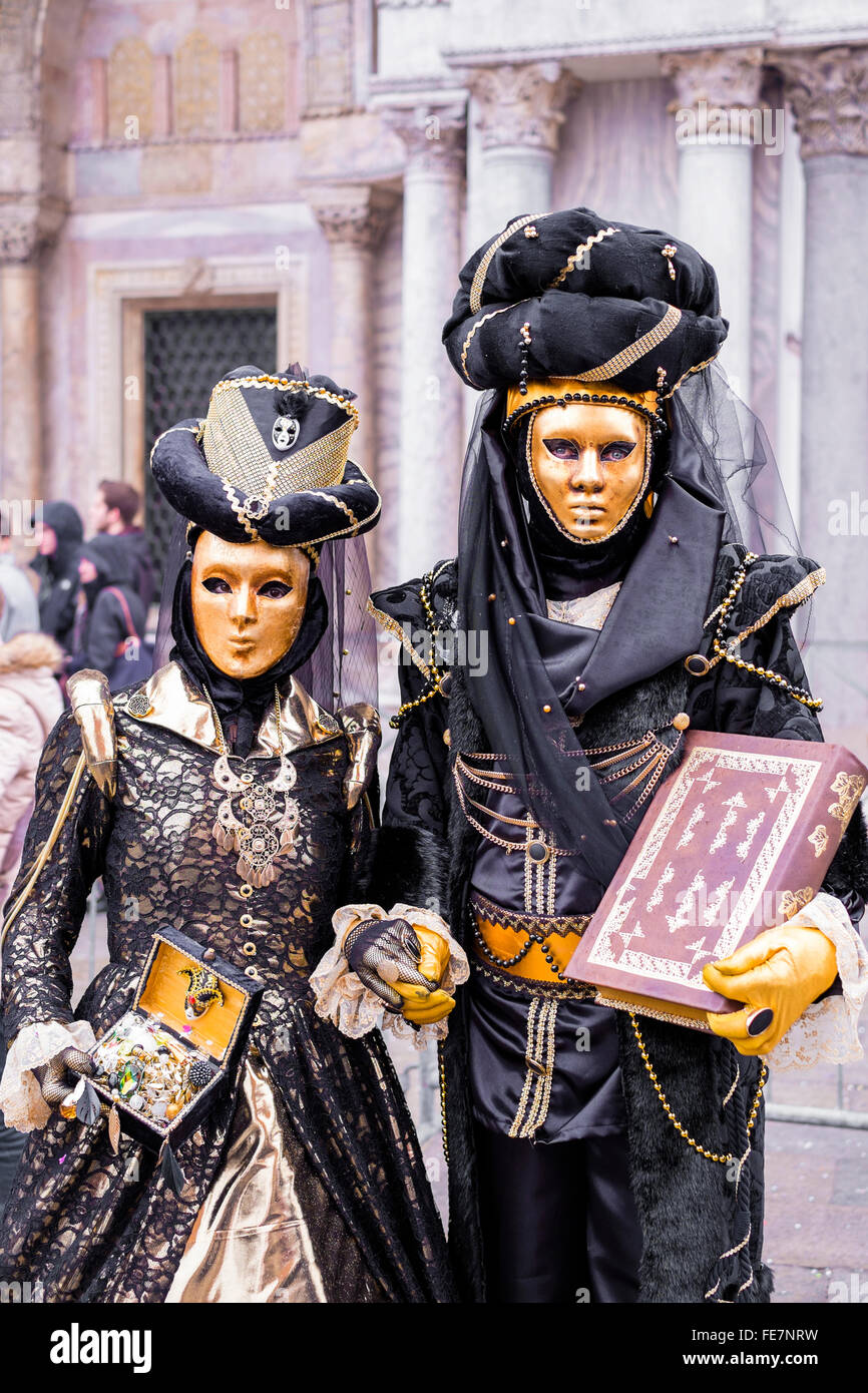 Two Venetian carnival costumes, Italy Stock Photo - Alamy