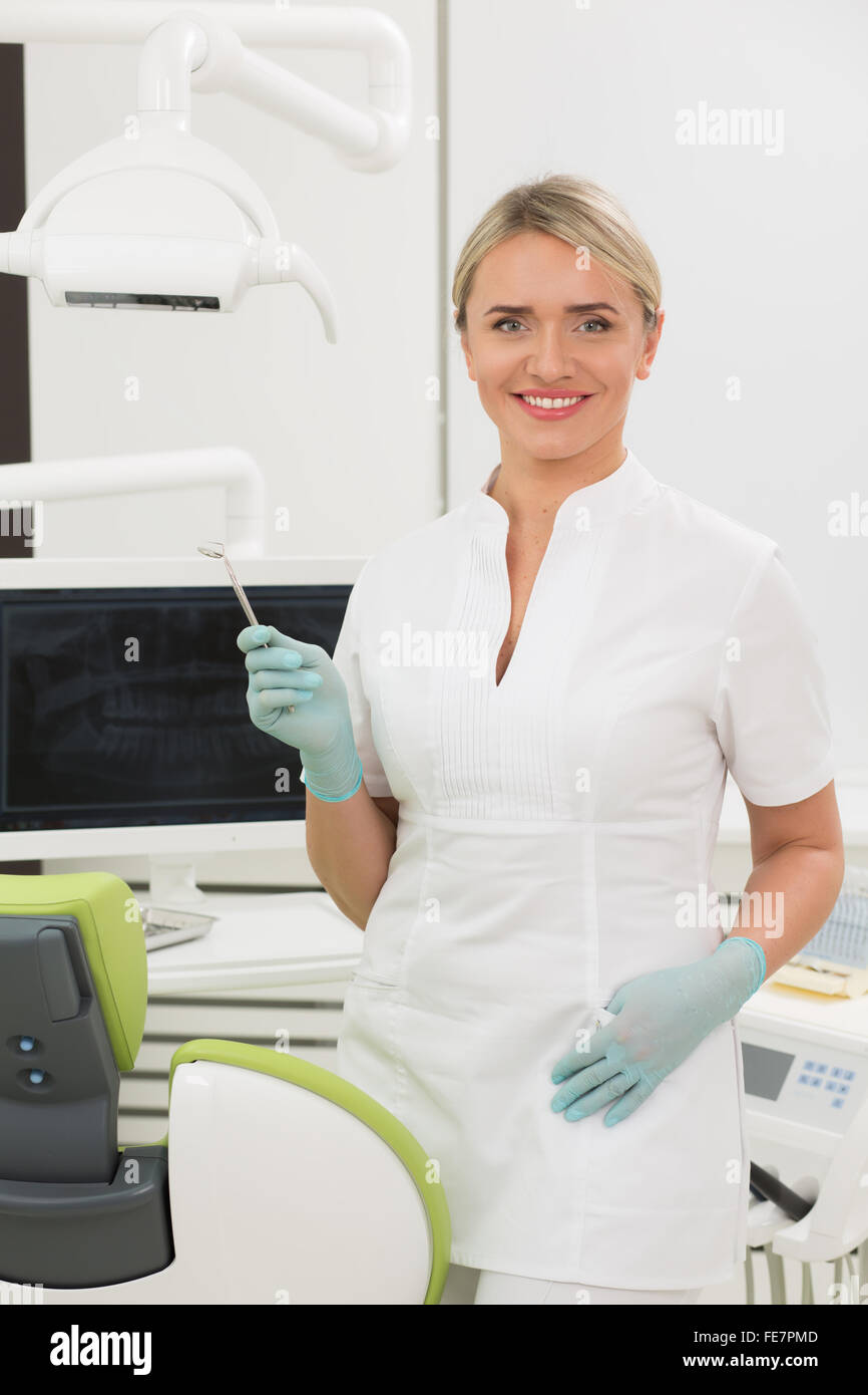 Dentist female posing for camera Stock Photo - Alamy