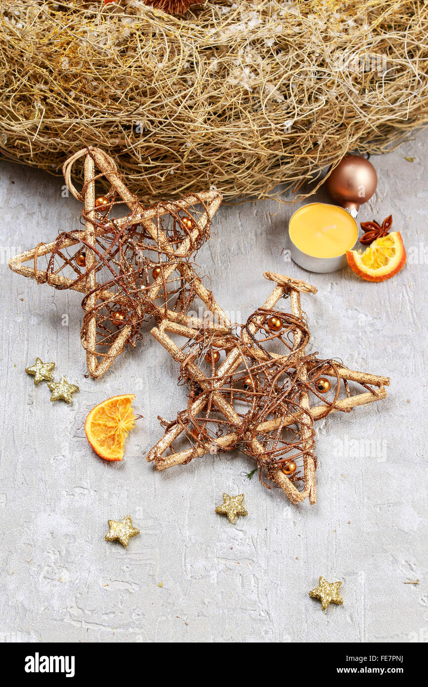 Wicker star decorated with dried orange Stock Photo - Alamy